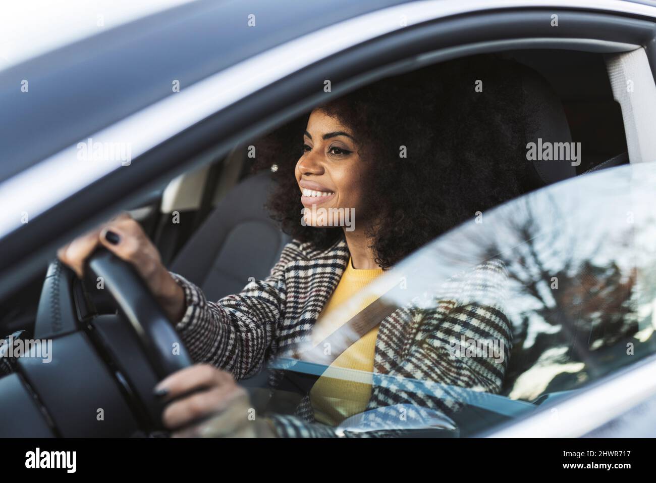 Woman driving car on road hi-res stock photography and images - Alamy