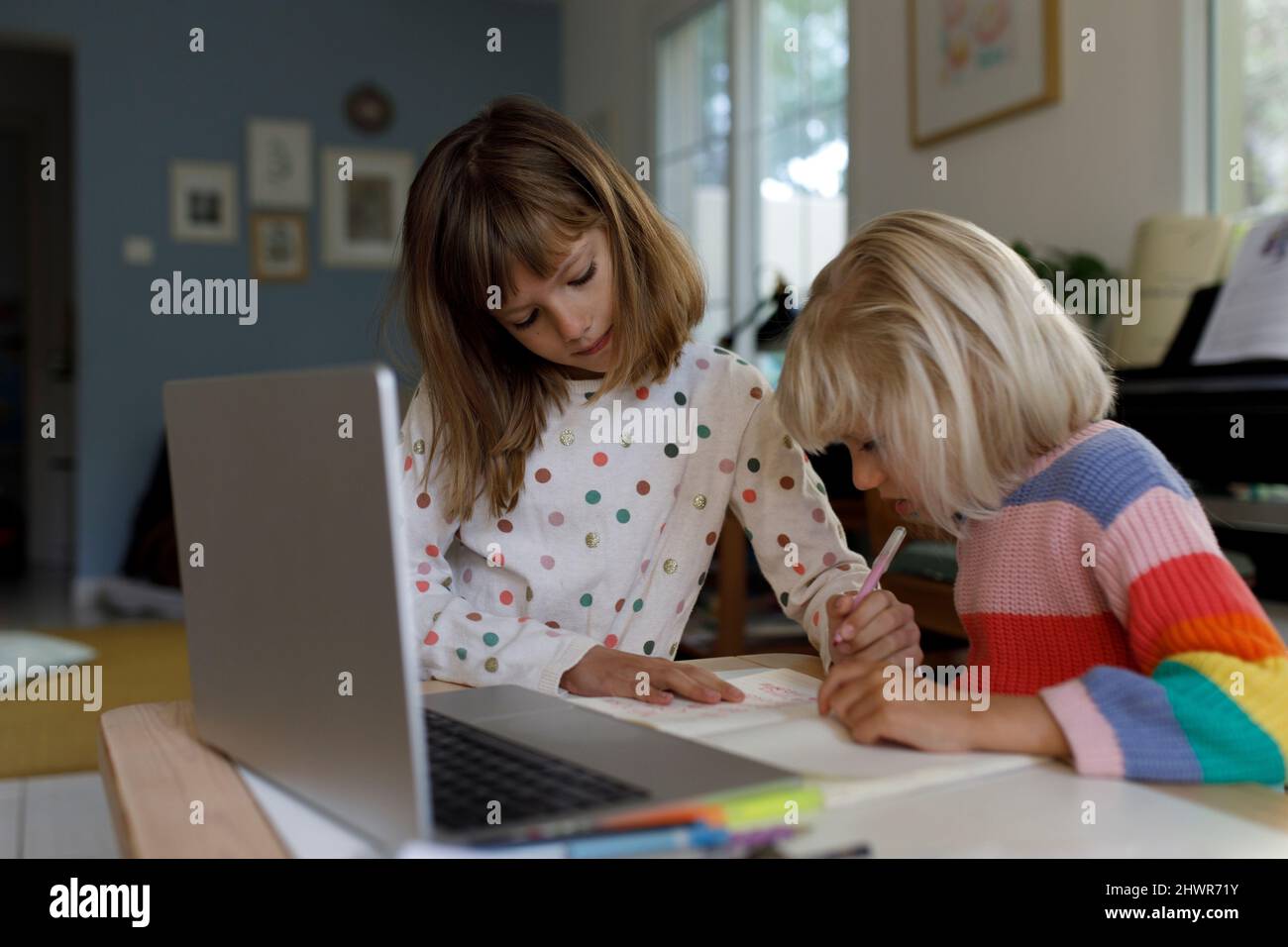 Helping out at home hi-res stock photography and images - Alamy