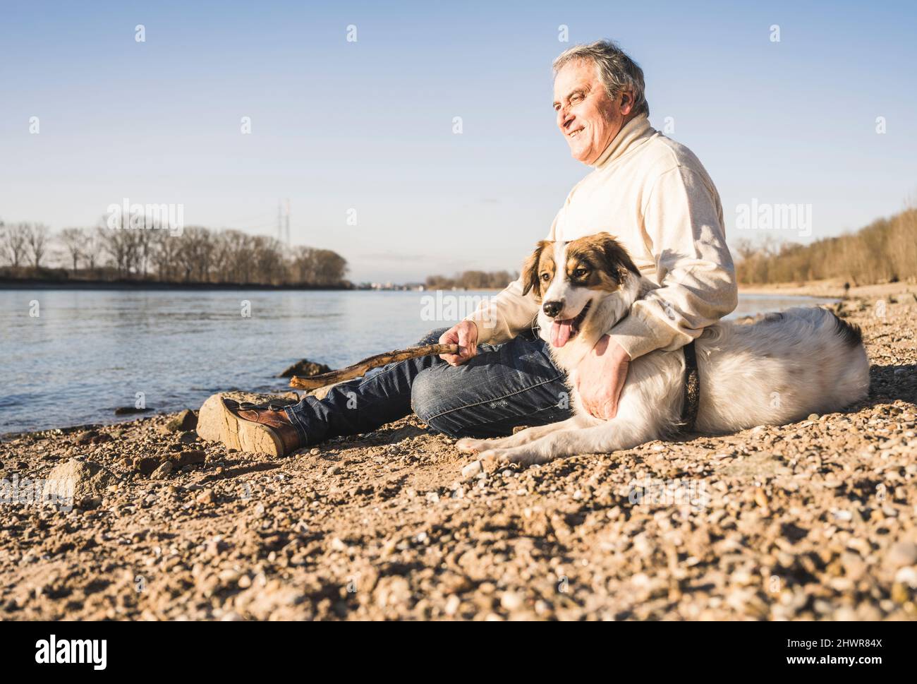 Man holding stick hi-res stock photography and images - Alamy