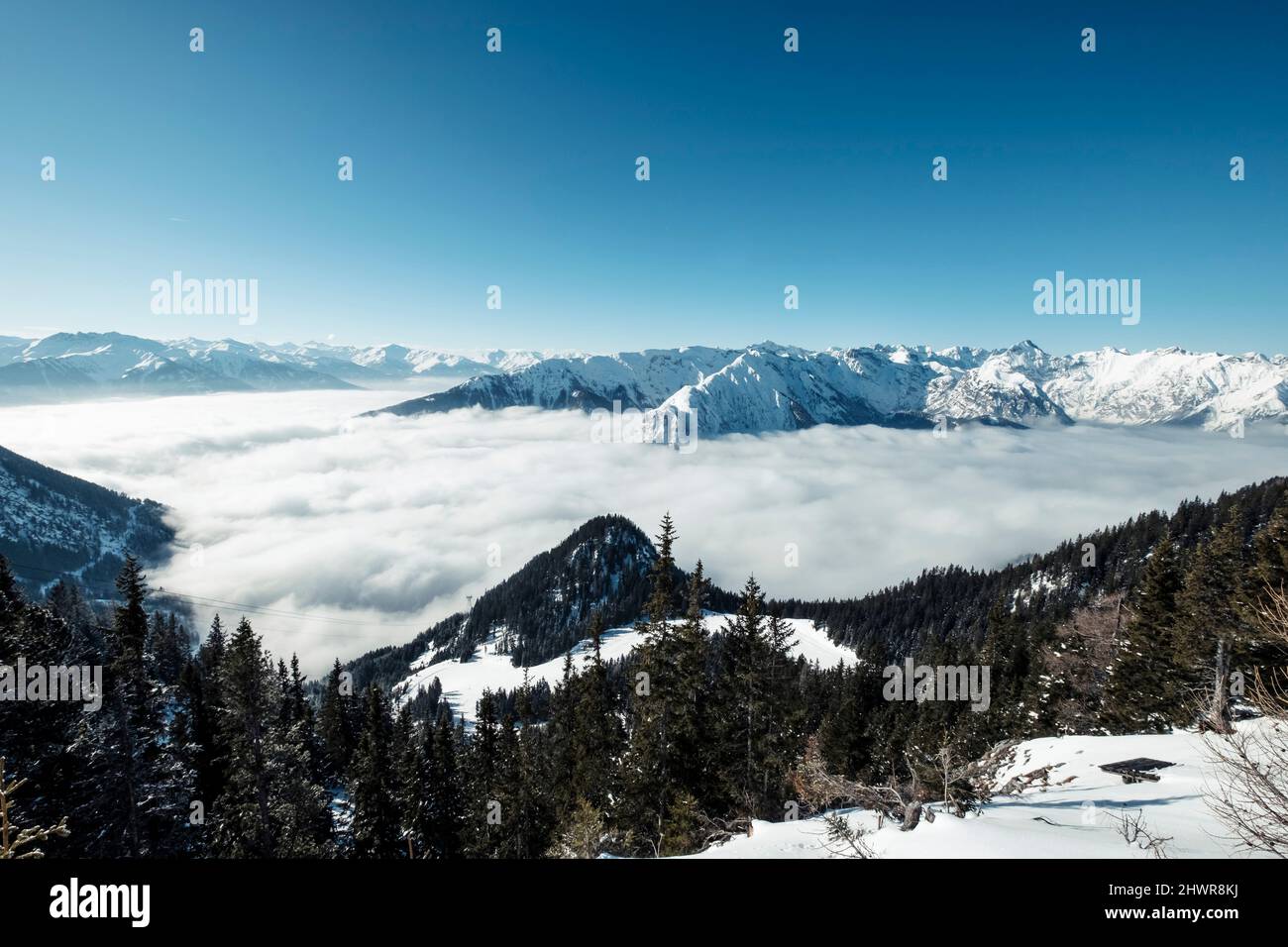 Rofan Mountains with heavy fog over Achen Lake and Inntal Stock Photo ...
