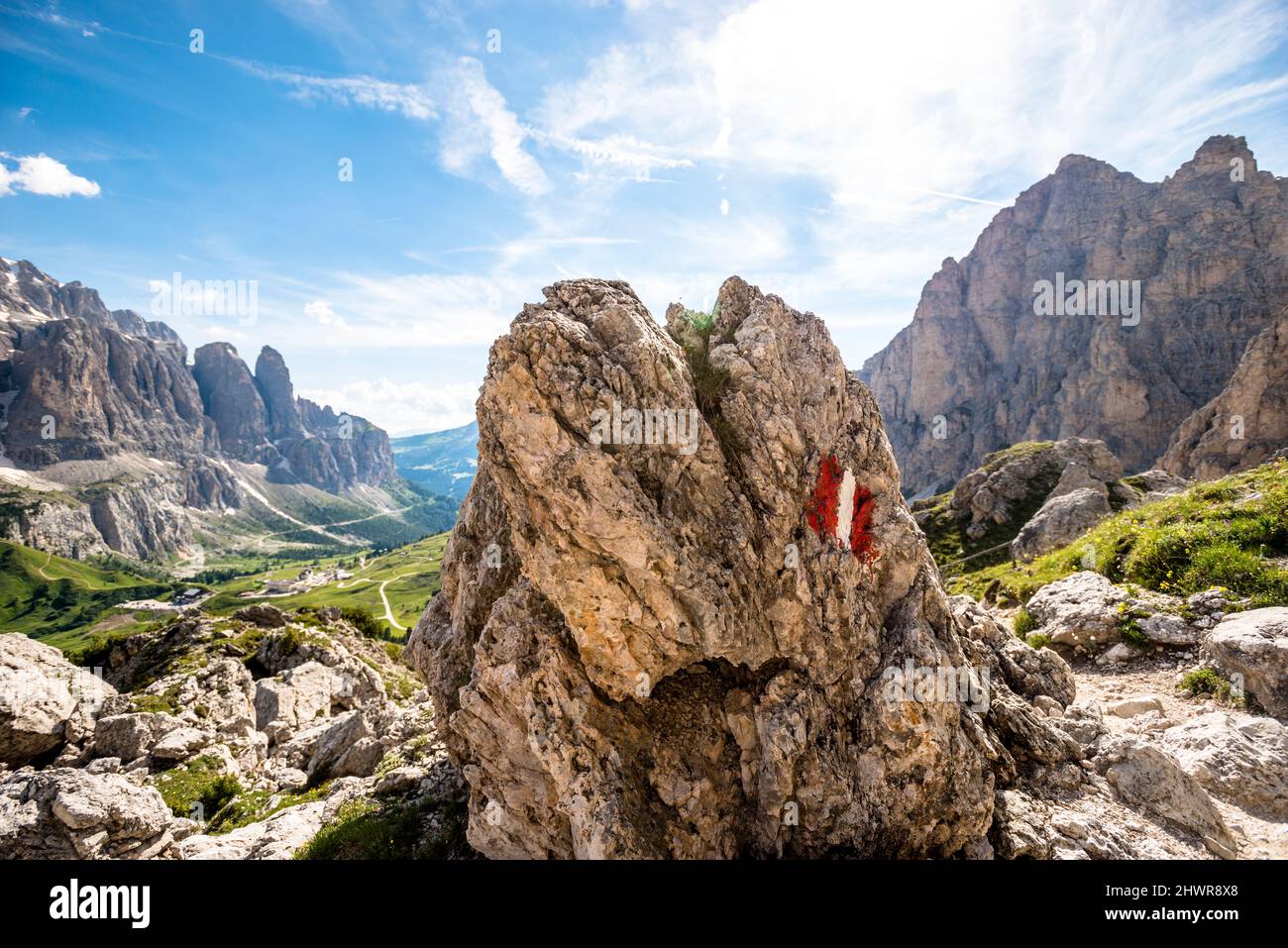 Italy, South Tyrol, Hiking trail mark painted on boulder in Sella Group ...