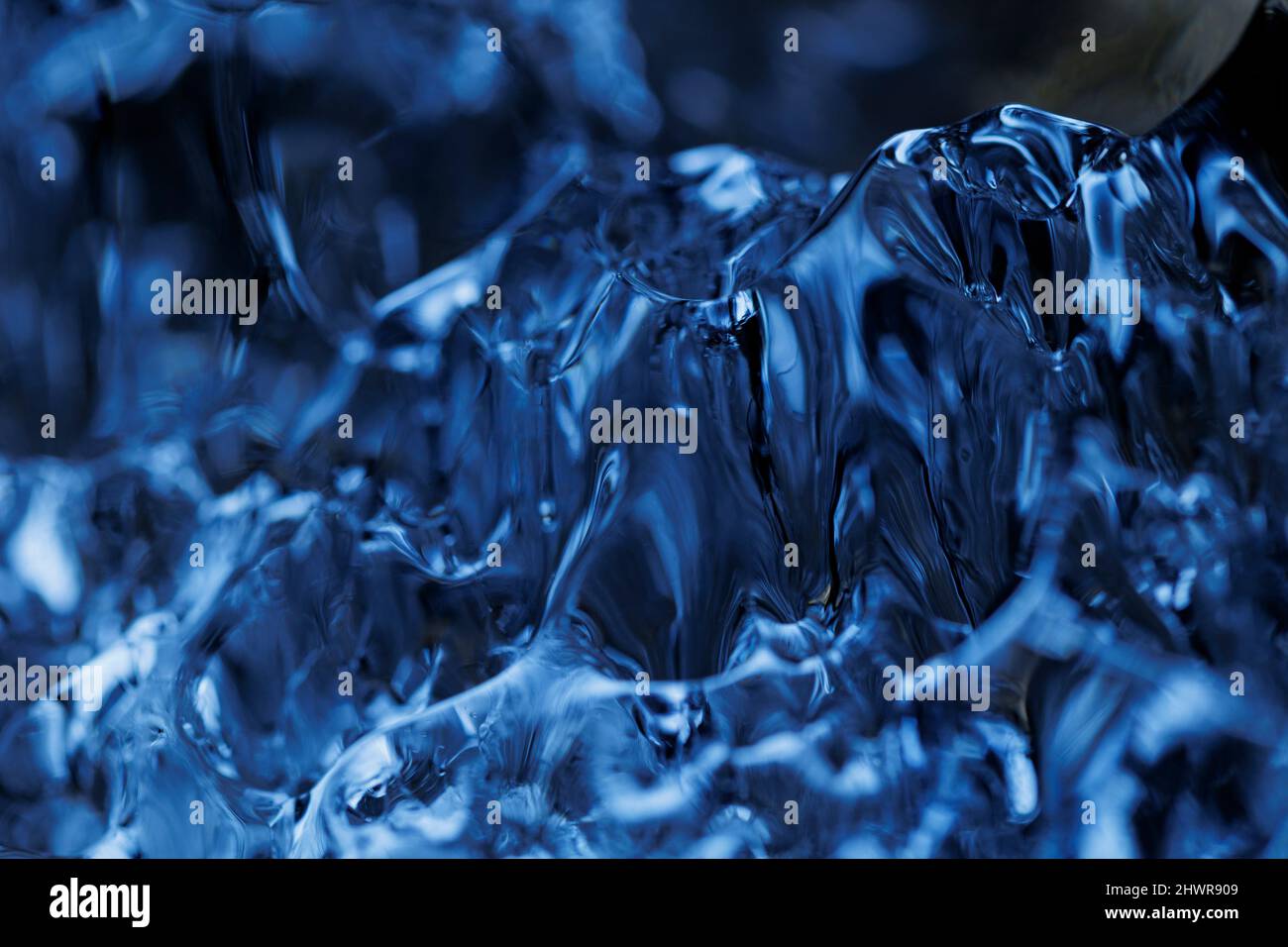 Full frame of clear blue melting ice Stock Photo - Alamy