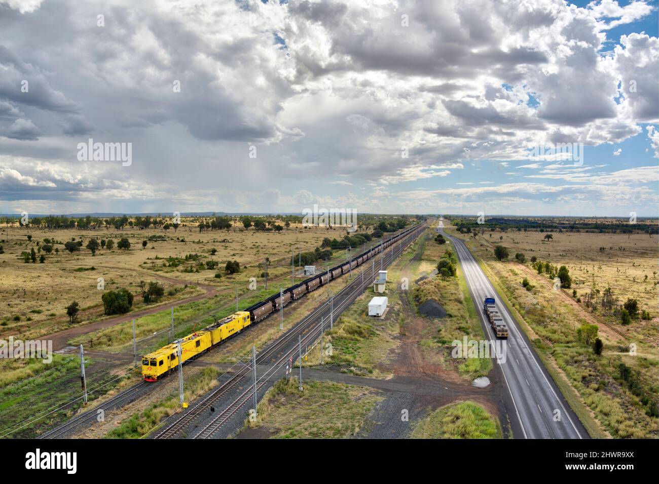 Aerial of coal train loading 10,000 tons of coal at Boonal - Blackwater ...