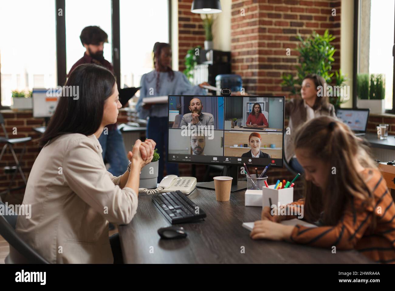 Woman in business video call conference meeting communicating to ...