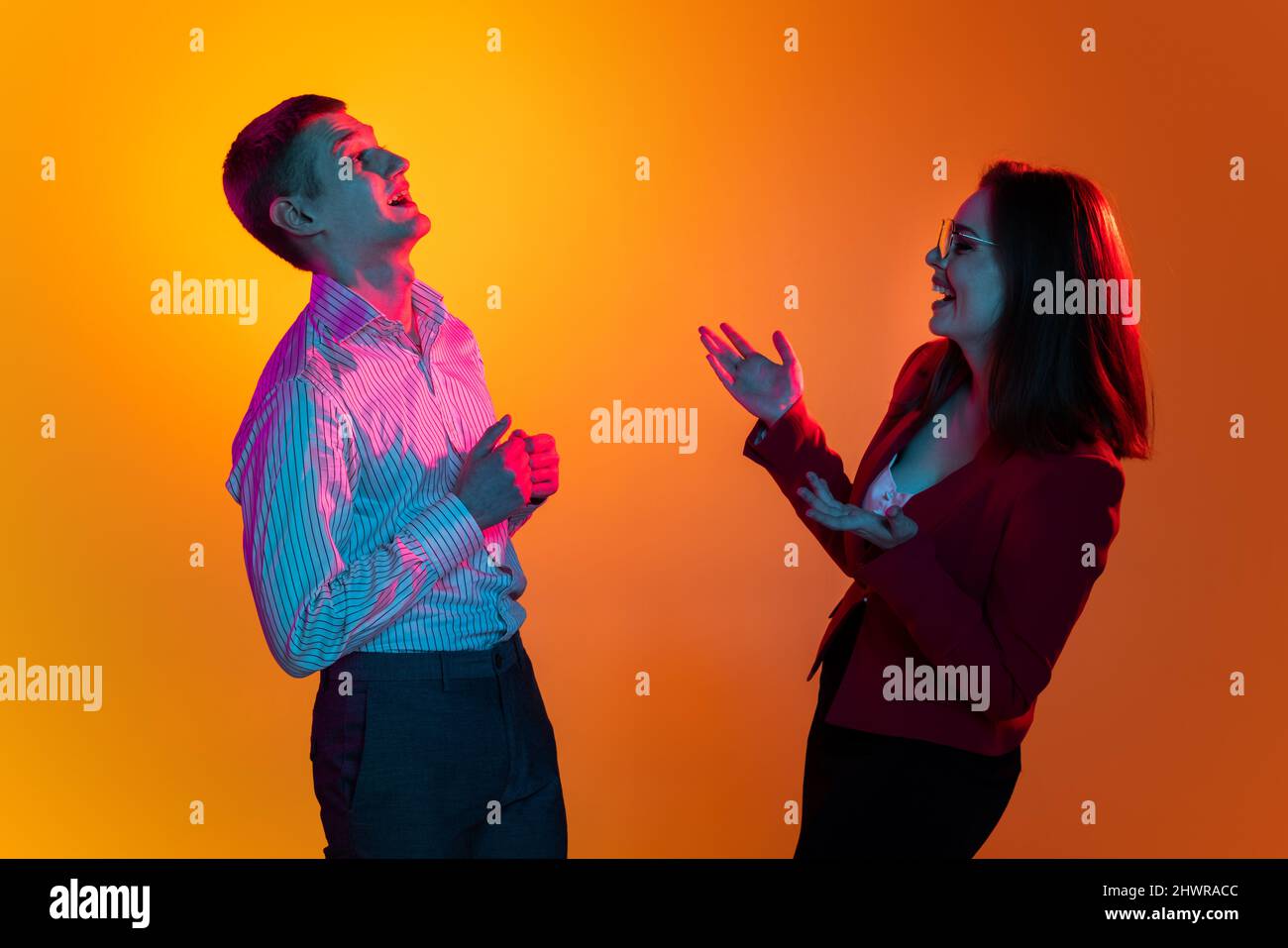 Portrait of two young people, man and woman, communicating in ...