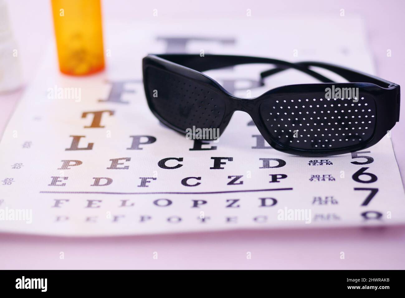 Ophthalmologist accessories glasses with a test target for vision ...