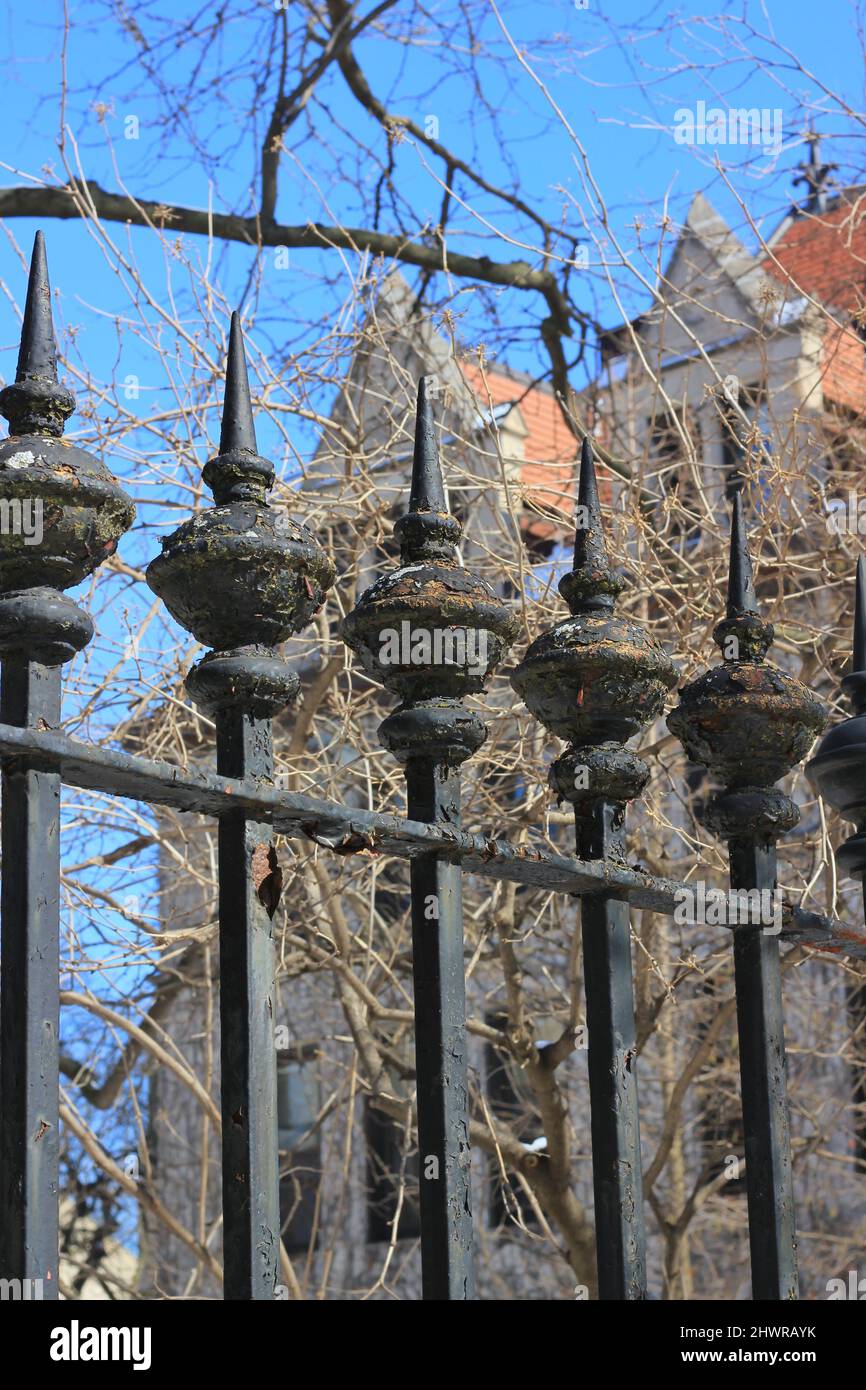 Old Gothic medieval cast iron protective fence with an ornamental motif ...