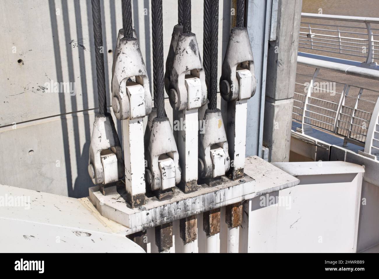 Detail of one of the four sets of steel-wire cables and their sheaves ...