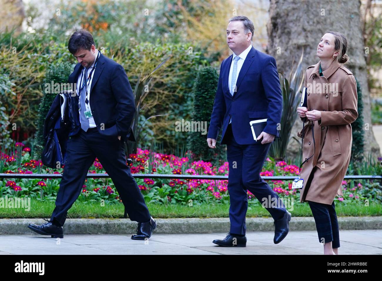 Minister without portfolio in the Cabinet Office Nigel Adams (centre ...