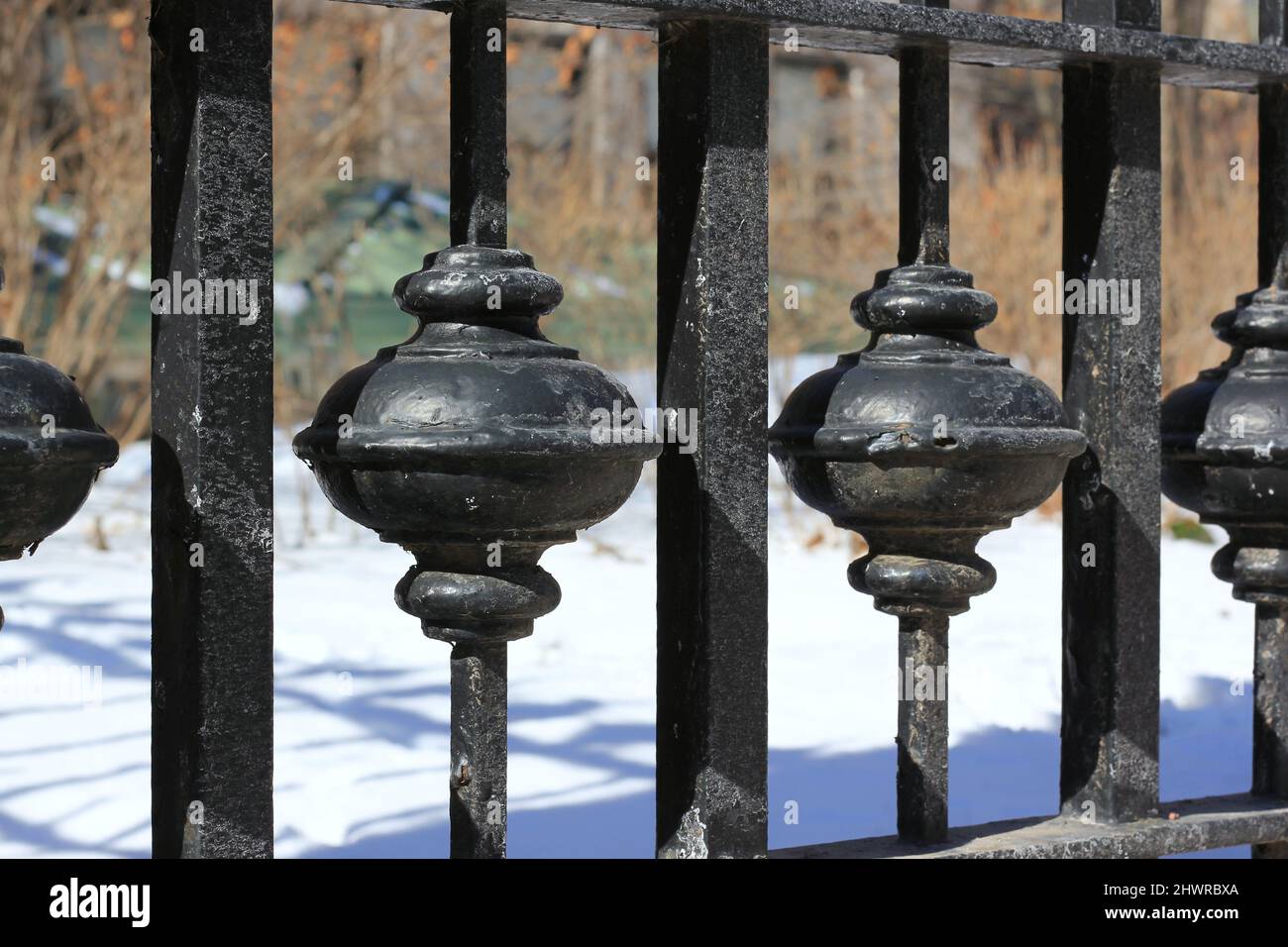 Old Gothic medieval cast iron protective fence with an ornamental motif ...