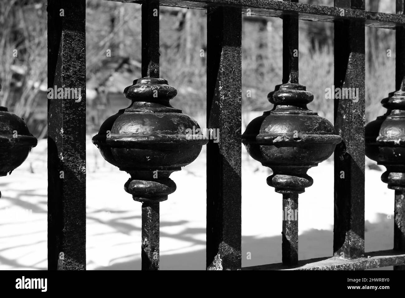 Old Gothic medieval cast iron protective fence with an ornamental motif ...