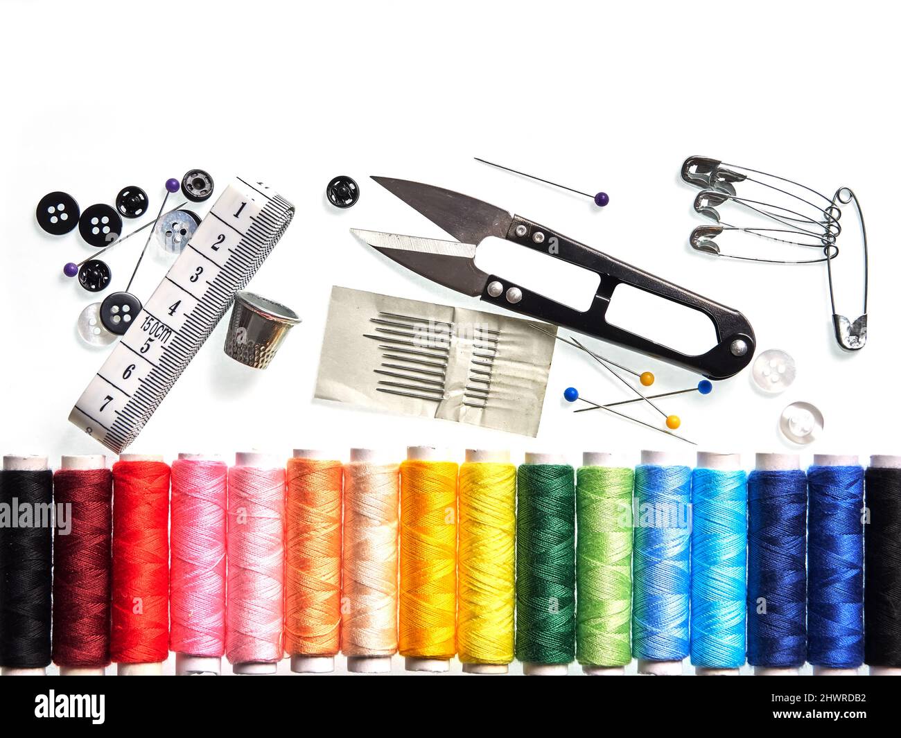 Travel sewing kit with spools of sewing thread, scissors, needles and ...