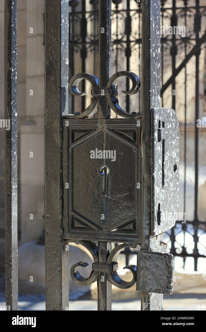 Old Gothic medieval cast iron protective fence with an ornamental motif ...