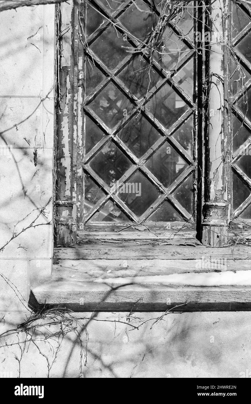 Old Gothic medieval window with panes in a diagonal frame Stock Photo ...