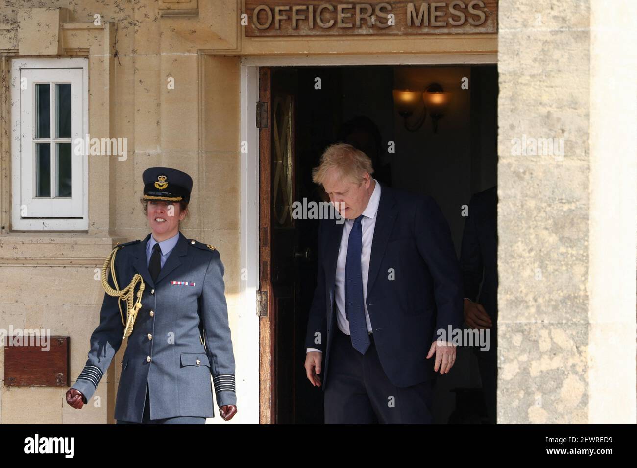 Prime Minister Boris Johnson leaves the Officers' Mess during a visit ...