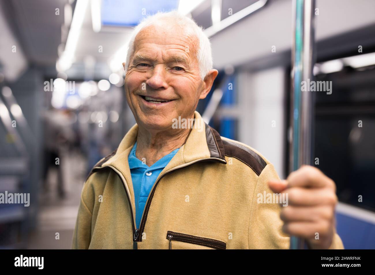Portrait of man traveling in subway train during daily Stock Photo - Alamy