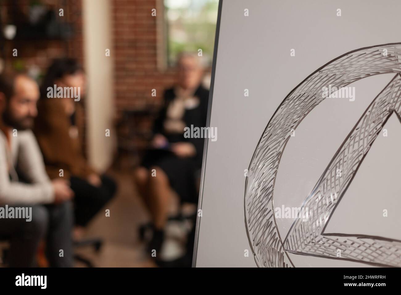 Close up of aa group meeting sign on white board. People having symbol ...