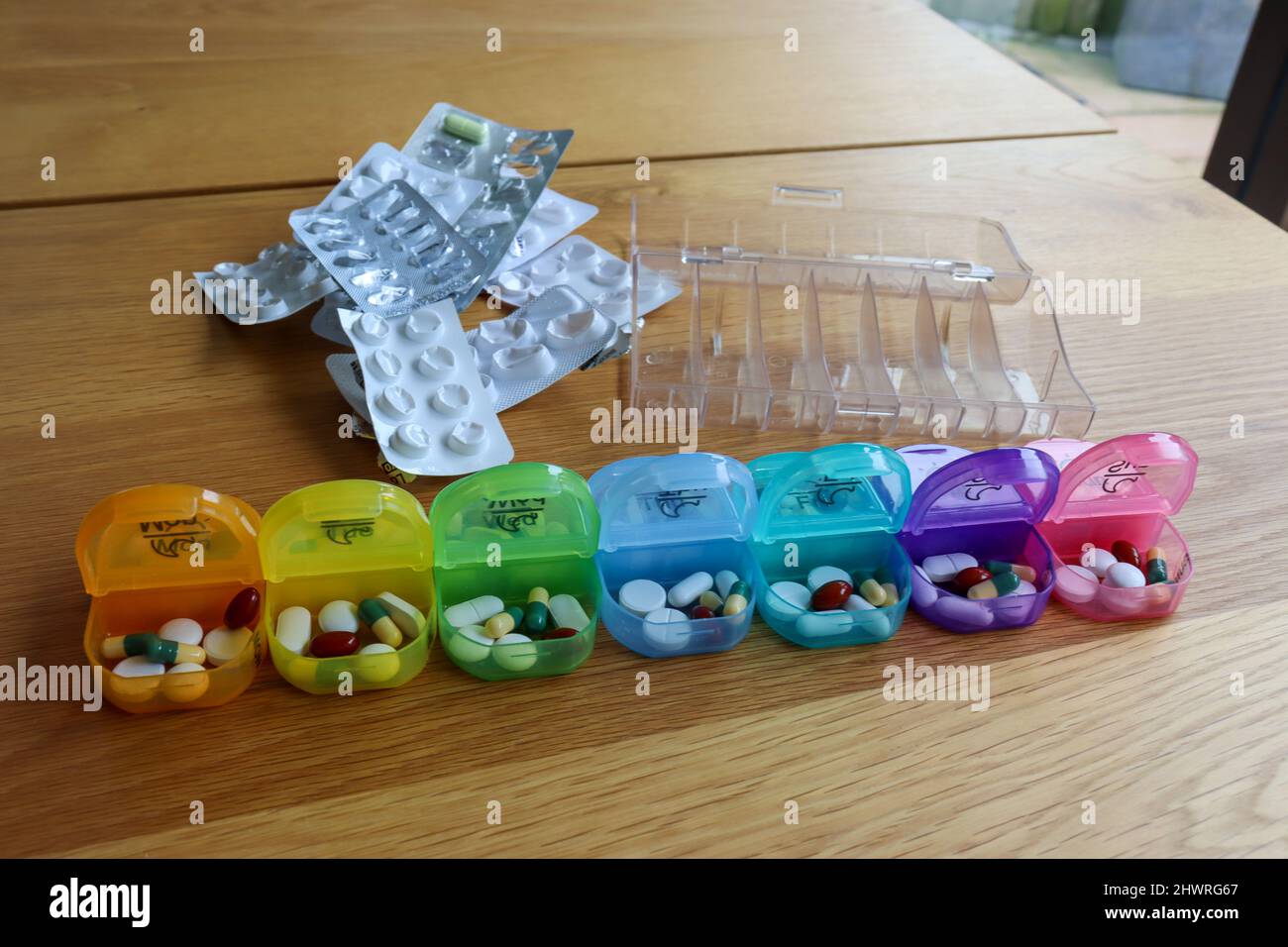 Pill Organisation, tablets and medication sorted in to a dosette box ...