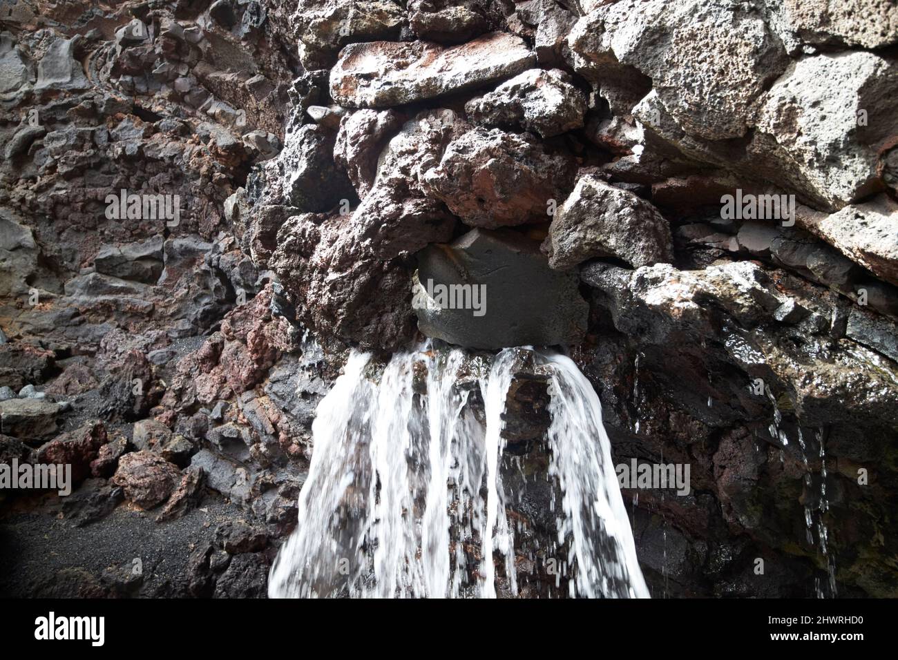waterfall coming out of the volcanic rocks jameo de la cazuela closed ...