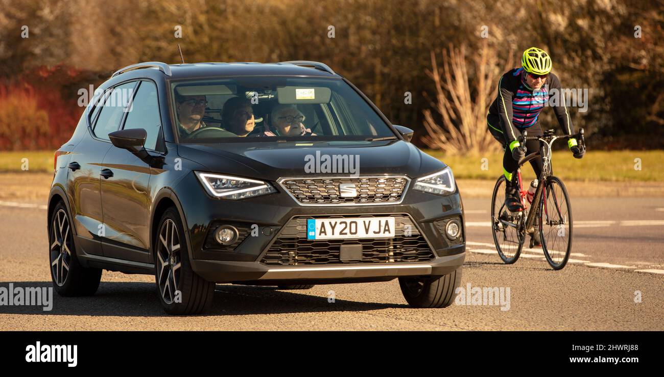 Car overtaking a bike hi-res stock photography and images - Alamy