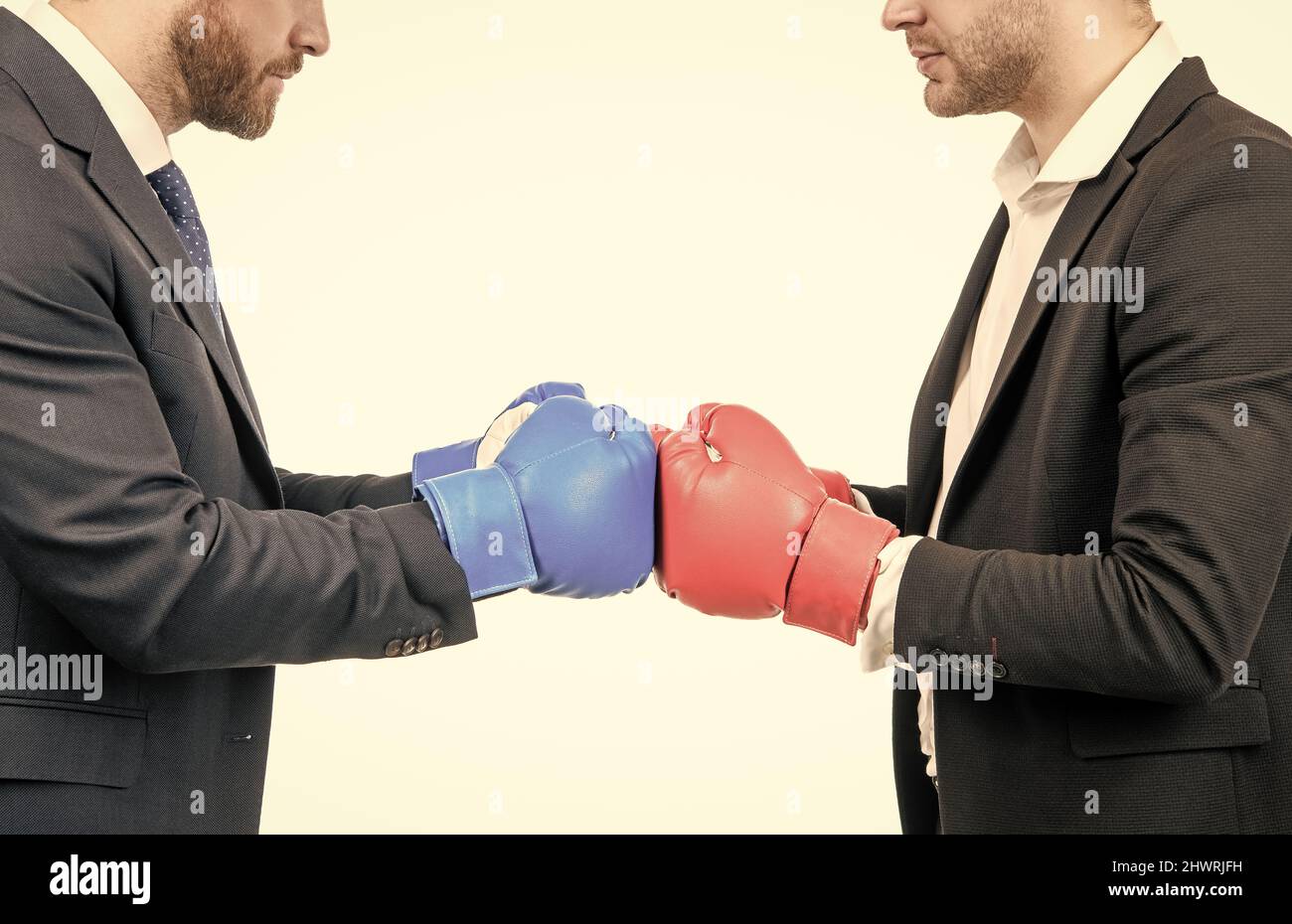 Contact. Fighting men cropped view. Businessmen fight with boxing ...