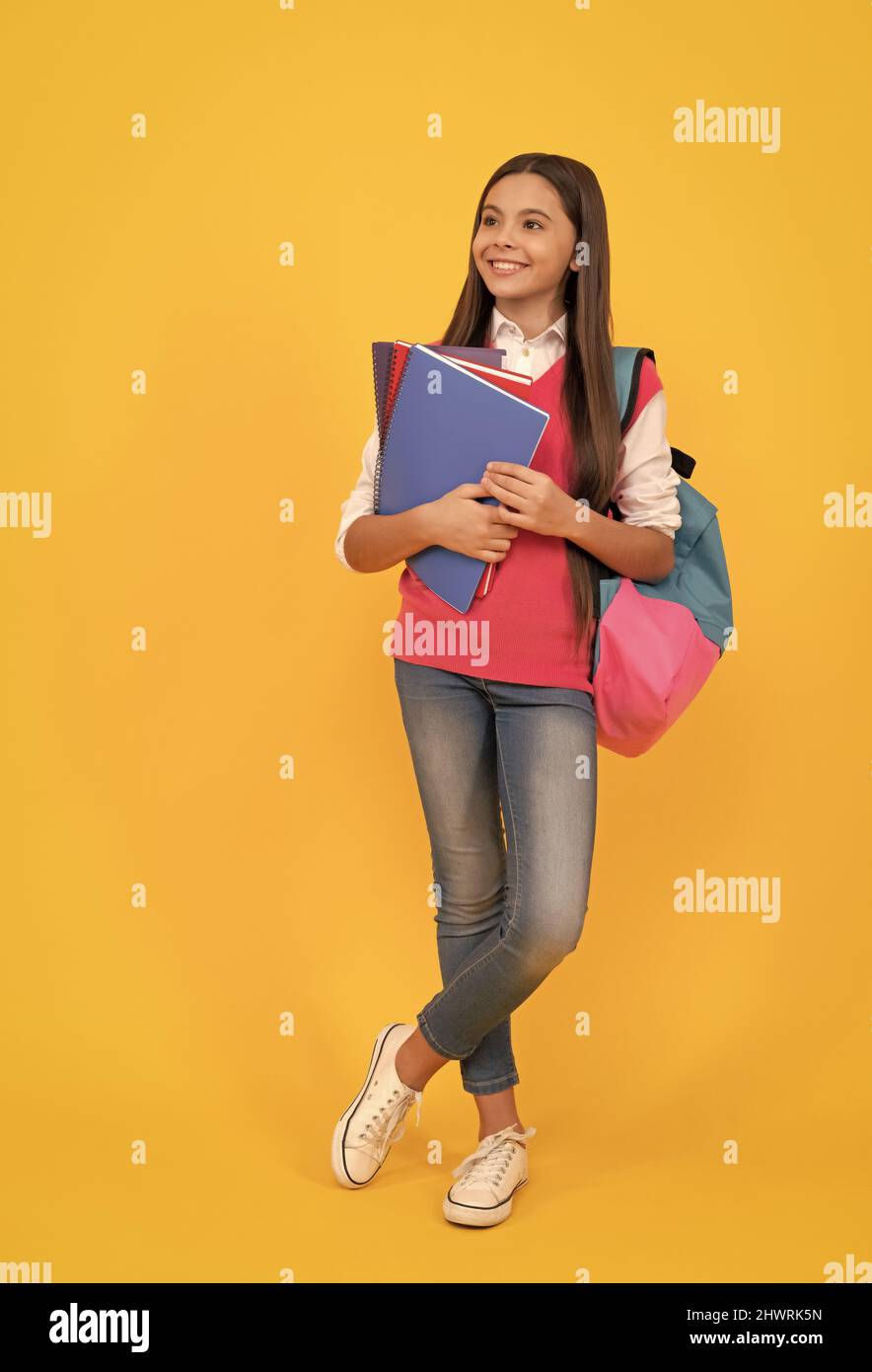 tween and youth. learning subject. young happy teen girl carry backpack ...