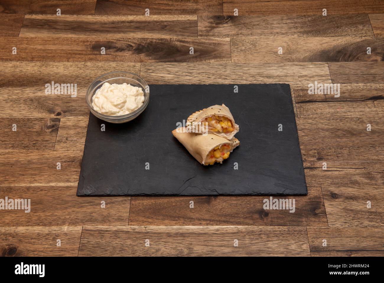 An empanada is a pie or pie that is packed with savory ingredients and ...