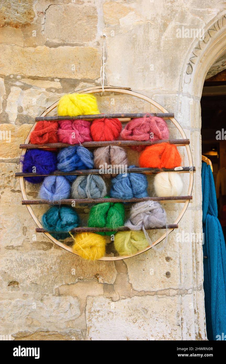 VEZELAY, FRANCE - AUGUST 29, 2015: Wool clothes shop display in Vezelay ...