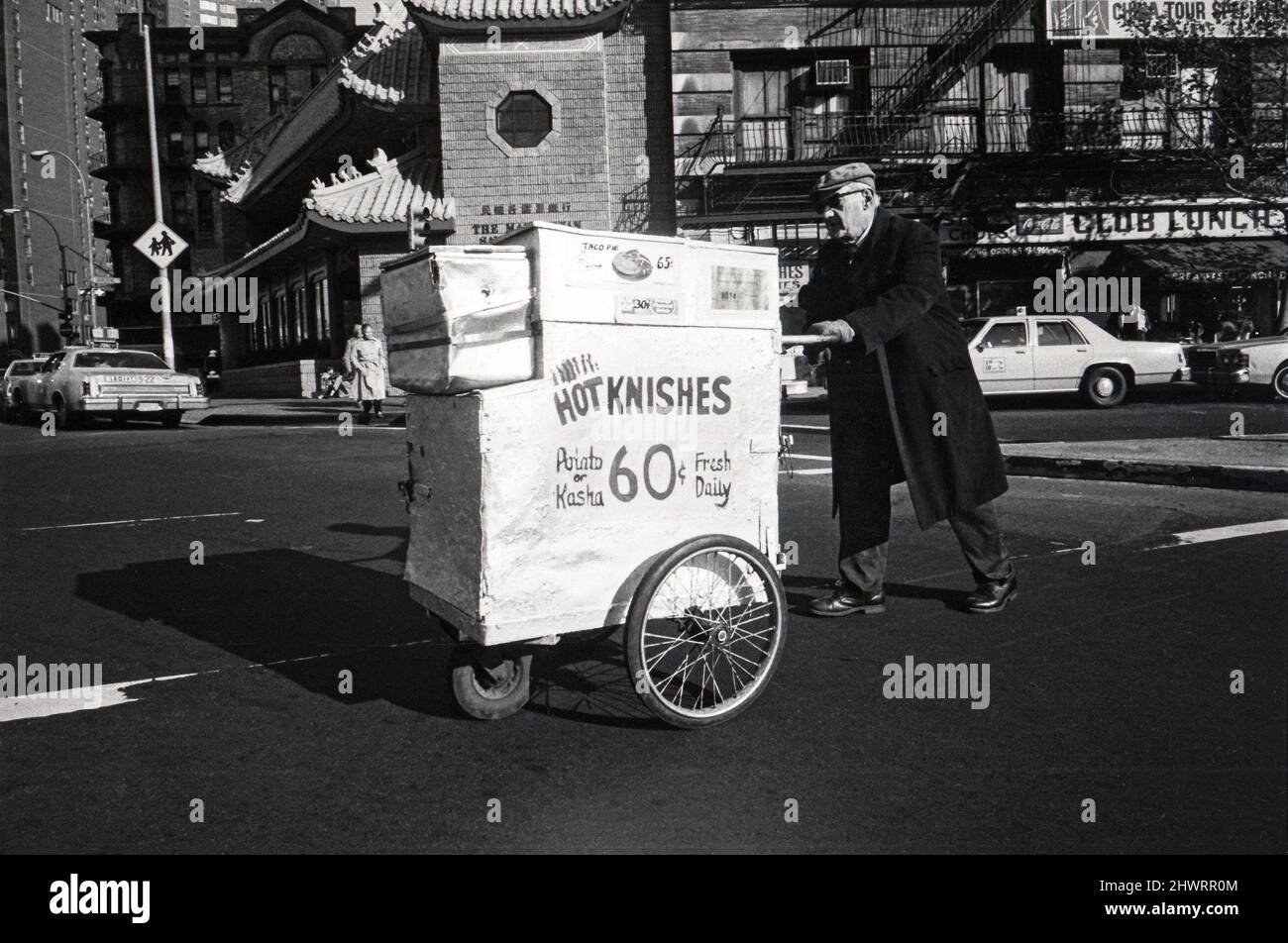 An older Jewish man selling knishes from a portable, three wheeled ...