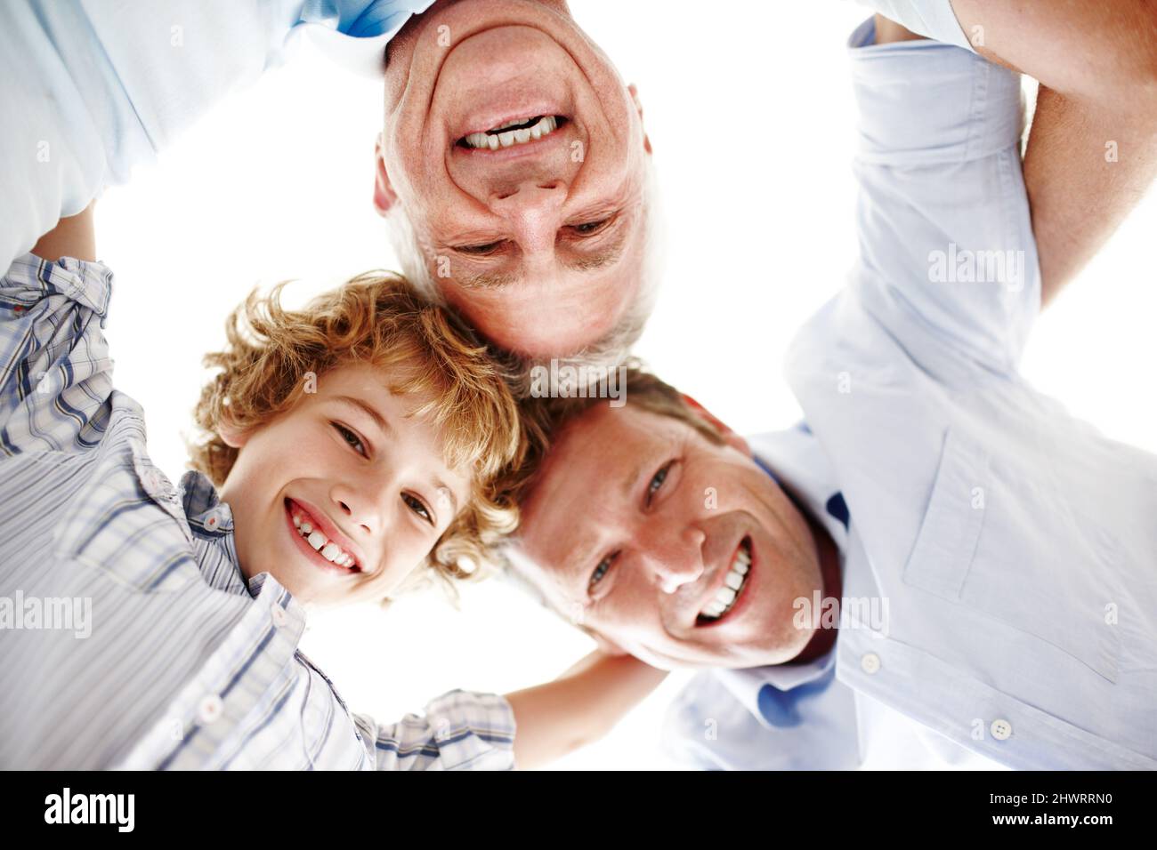 The boys of summer. Low angle portrait of a handsome man standing with ...