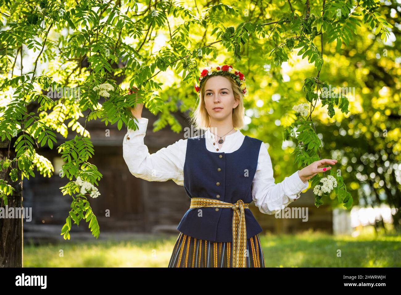 Woman in traditional clothing posing on nature in village Stock Photo ...