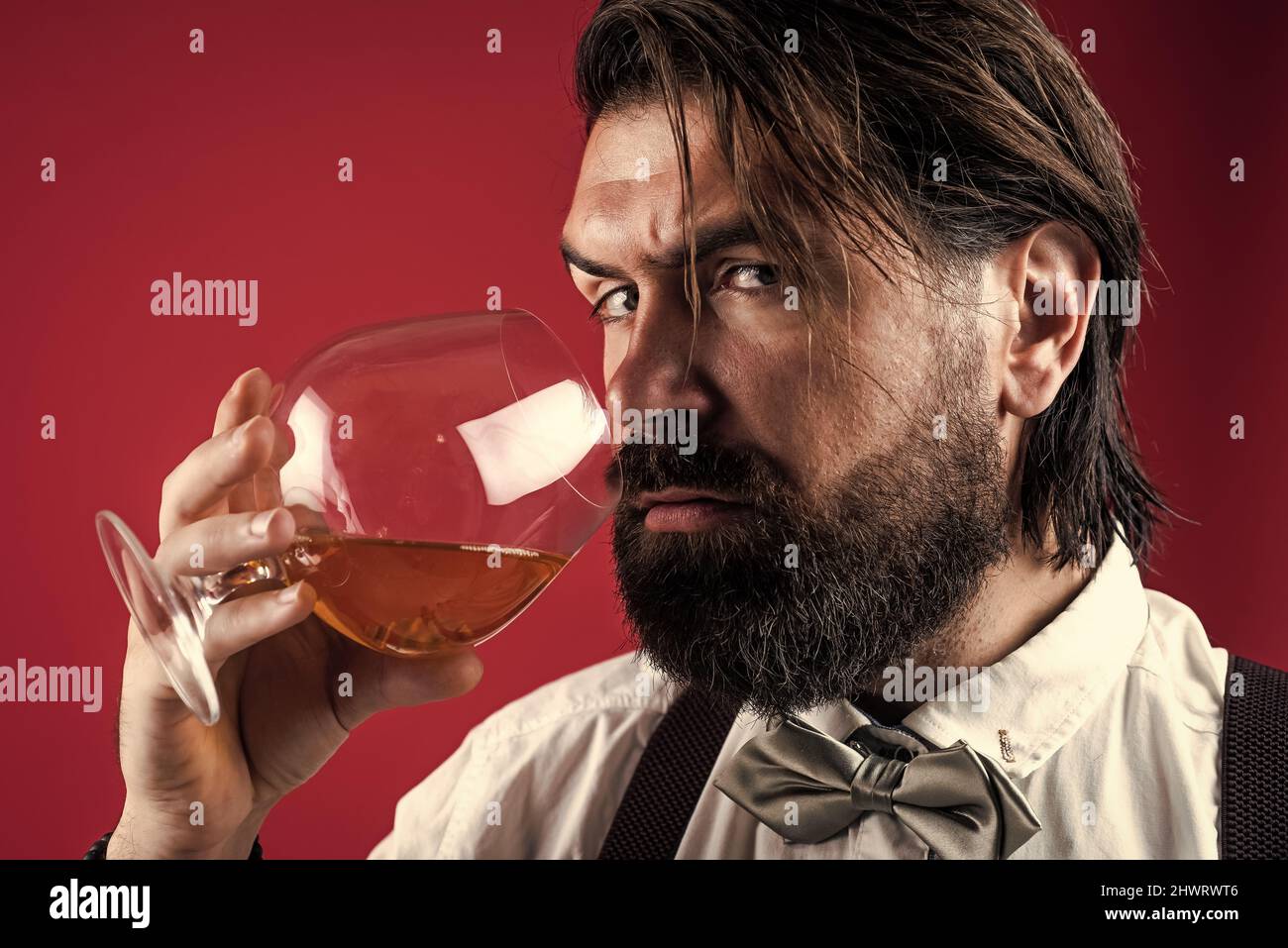 just one sip. brutal handsome man with moustache. mature guy with ...
