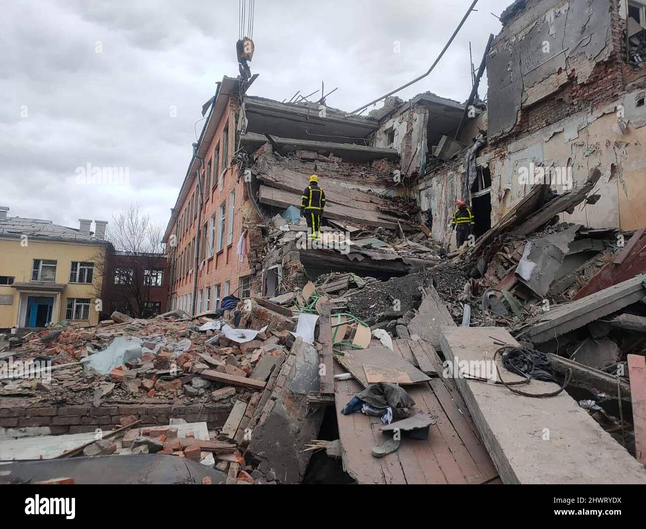 Chernihiv, Ukraine. 07th Mar, 2022. Rescuers dismantle rubble from a ...
