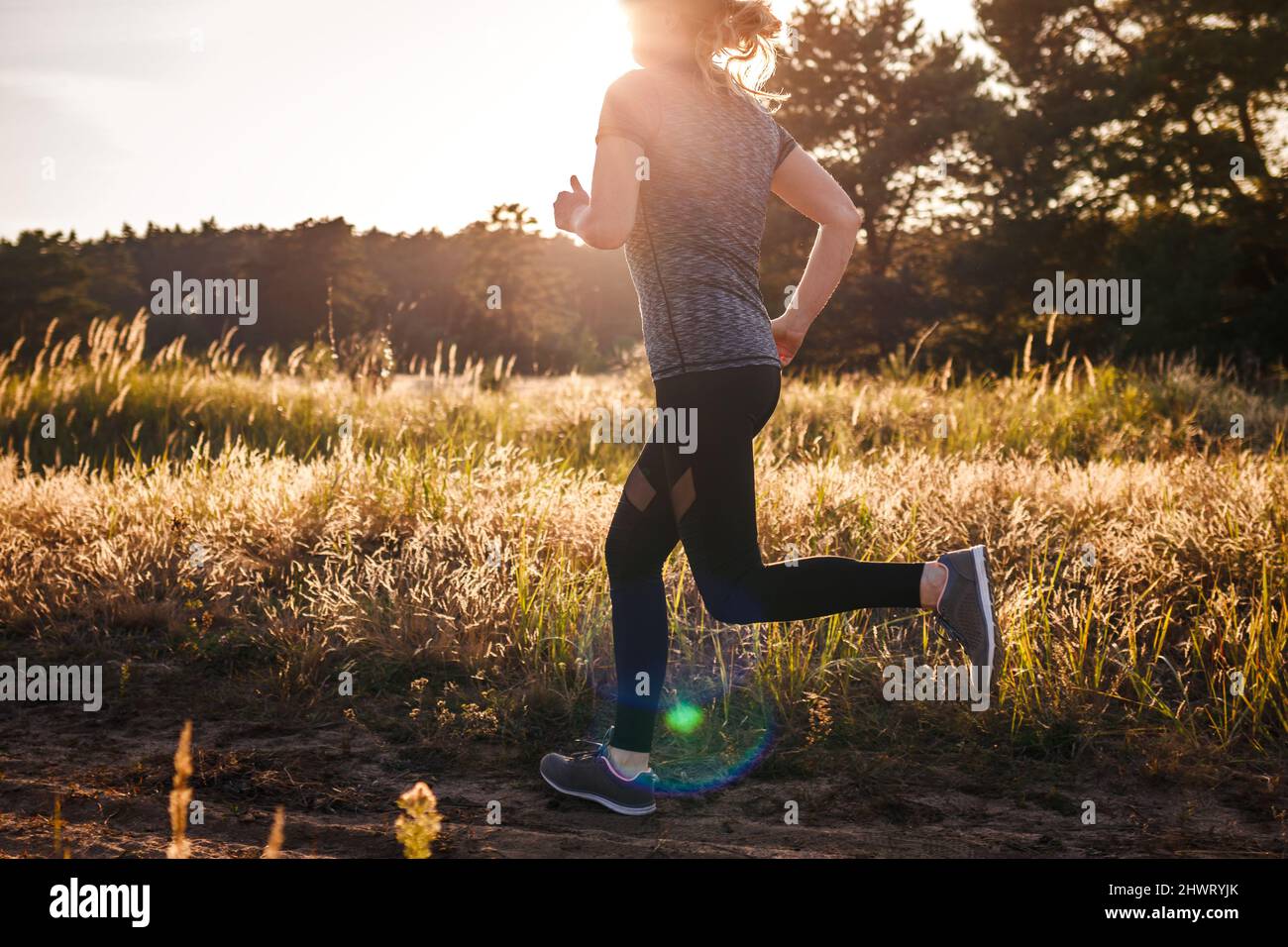 Muscular legs woman running hi-res stock photography and images - Alamy