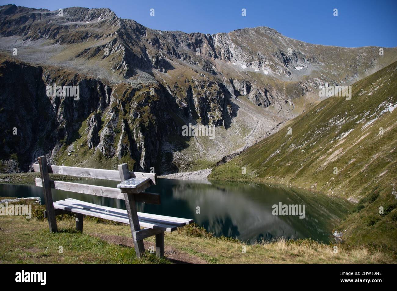 Wooden bench with a view of the "Seebachsee Stock Photo - Alamy