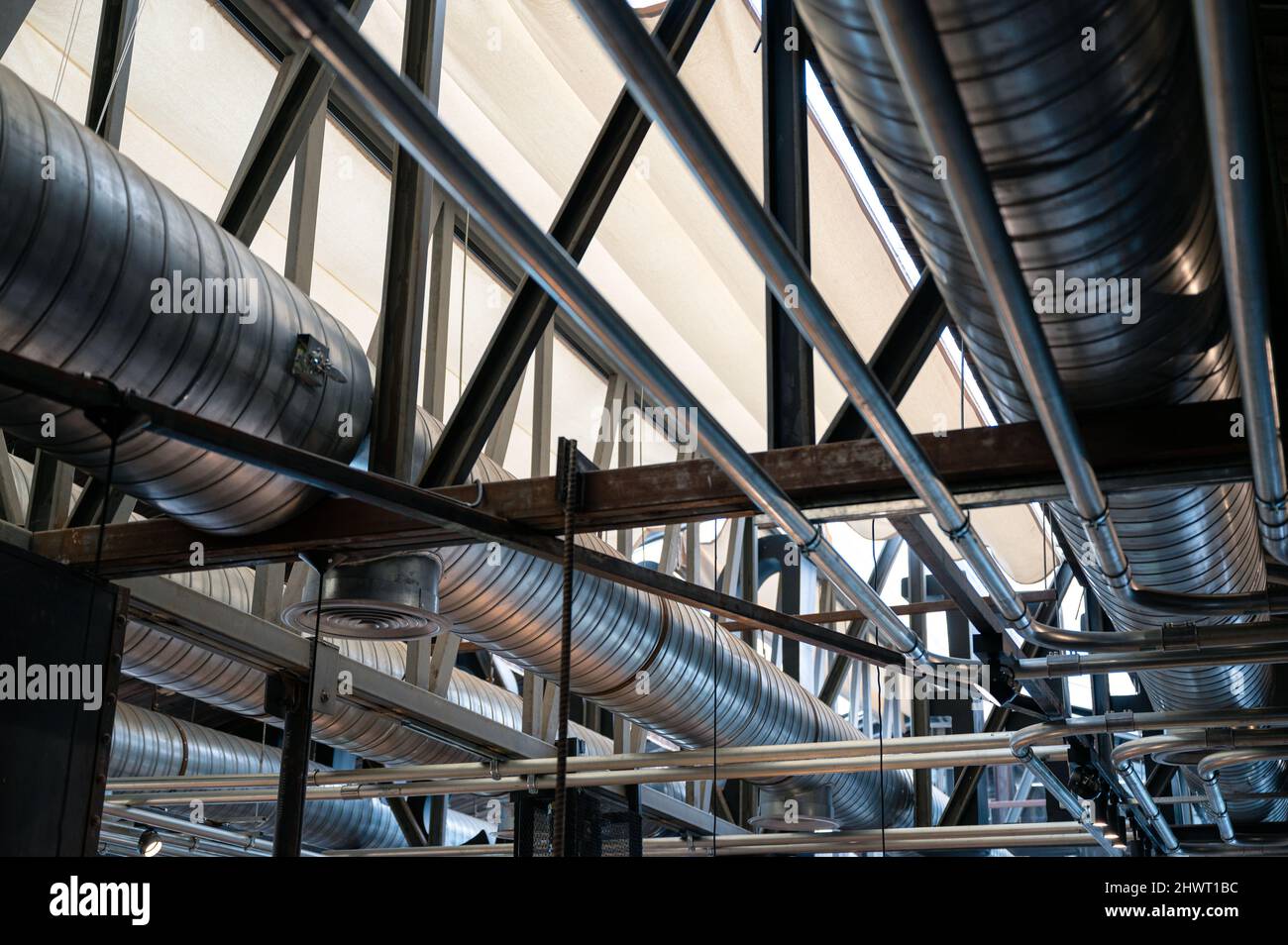 Ceiling structure with steel ventilation pipe and shiny pipe systems ...