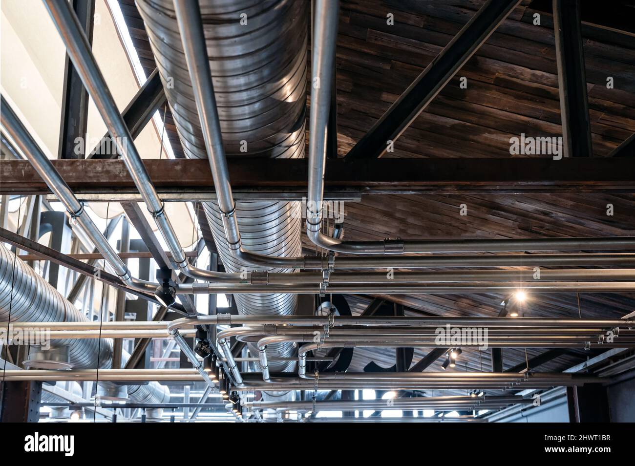 Ceiling structure with steel ventilation pipe and shiny pipe systems ...