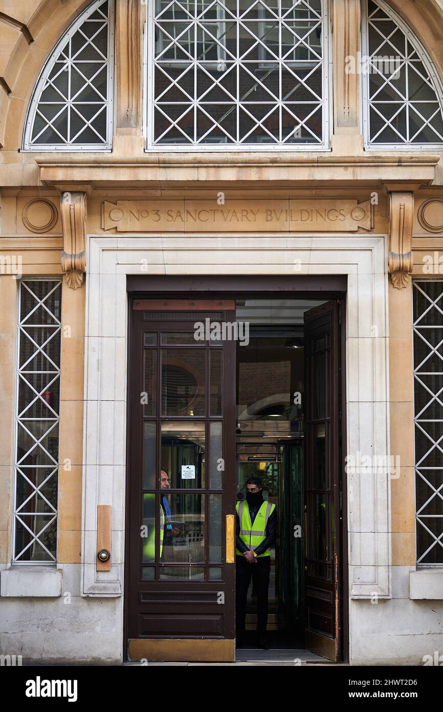 Security guards at the entrance to the british government's department ... Security guards at the entrance to the british government's department ...