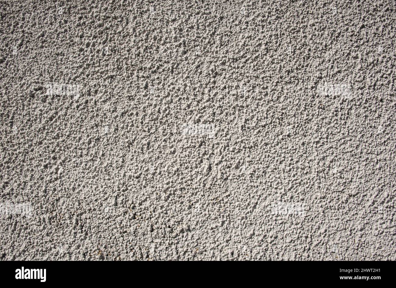 white plaster background with roughcast at a wall in sunlight Stock ...