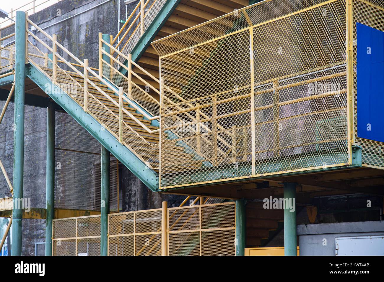 yellow metal fire escape outside a building Stock Photo - Alamy