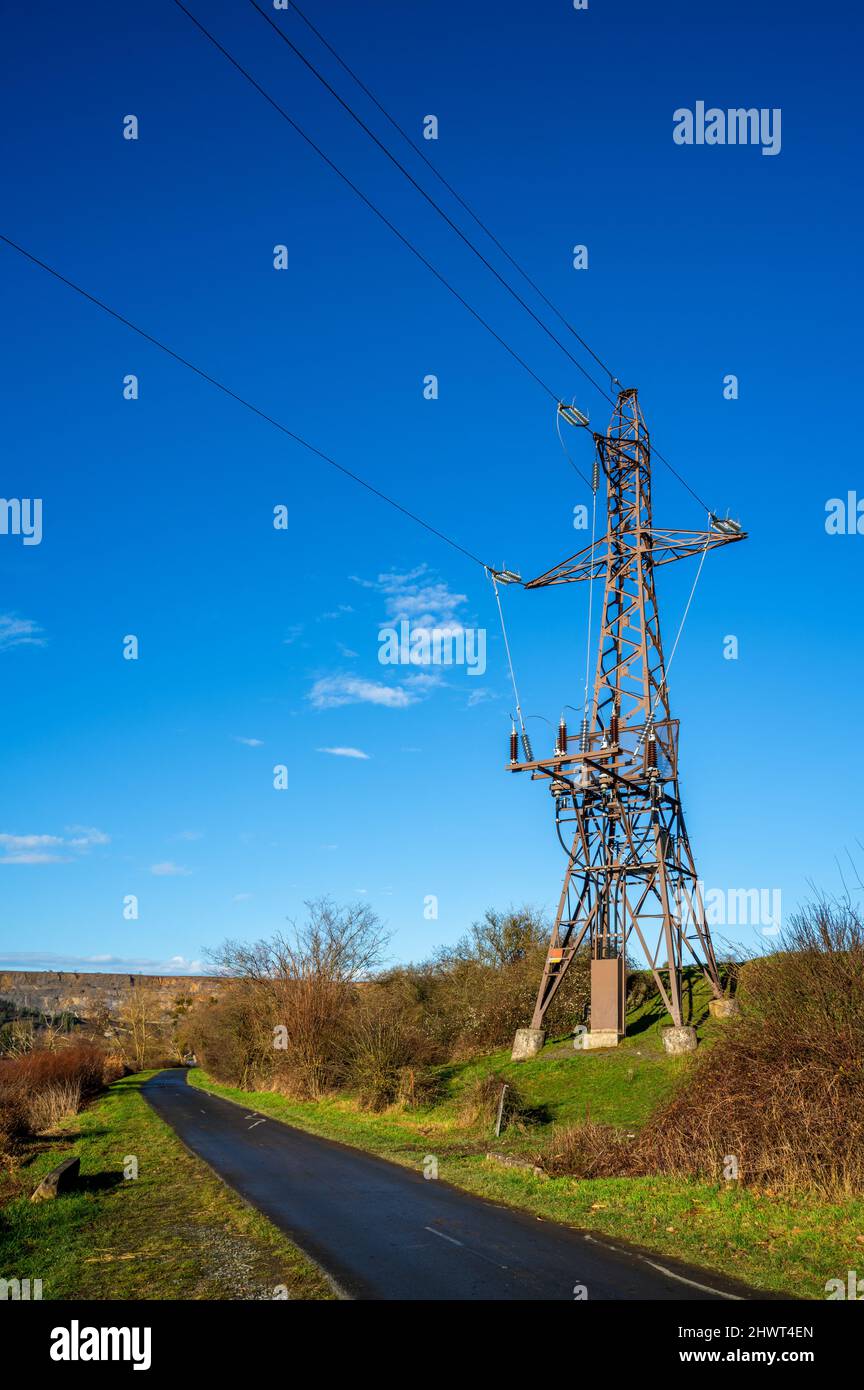 Landscape with power pylon in French Ardennes Stock Photo - Alamy