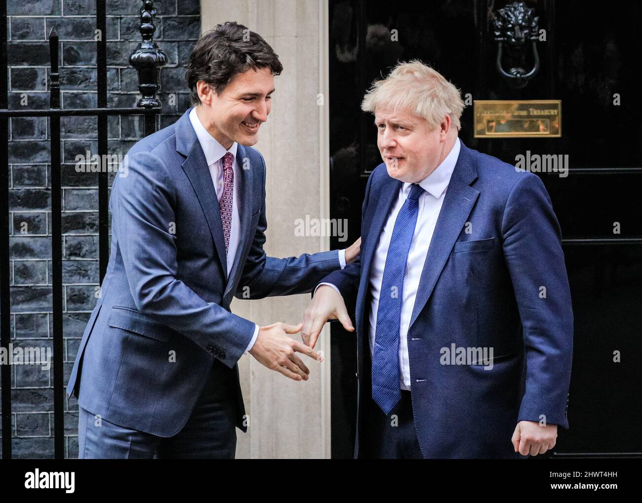 London, UK. 07th Mar, 2022. Justin Trudeau arrives and is welcomed by ...