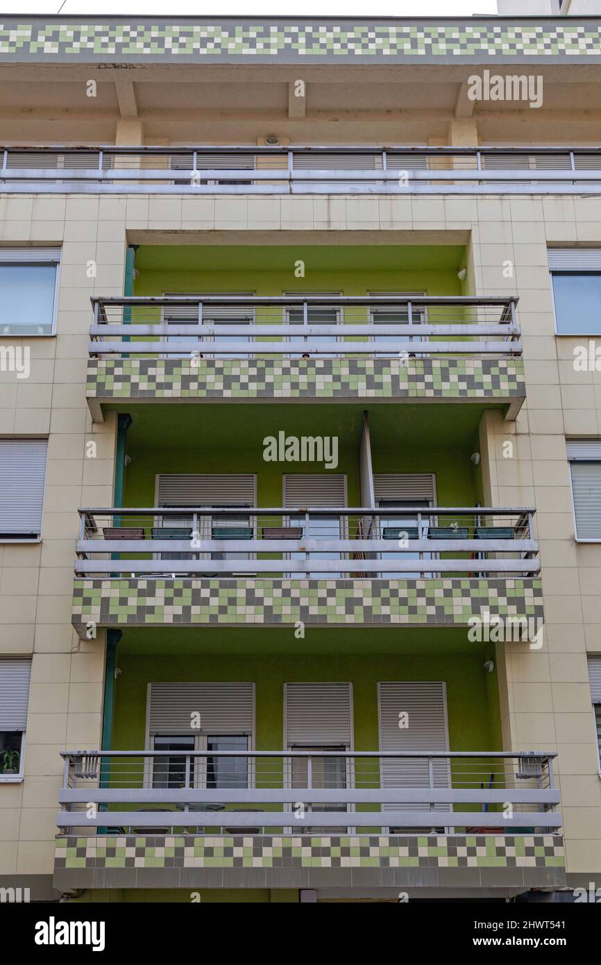 Green Terrace With Tiles at Modern Condo Building Stock Photo - Alamy