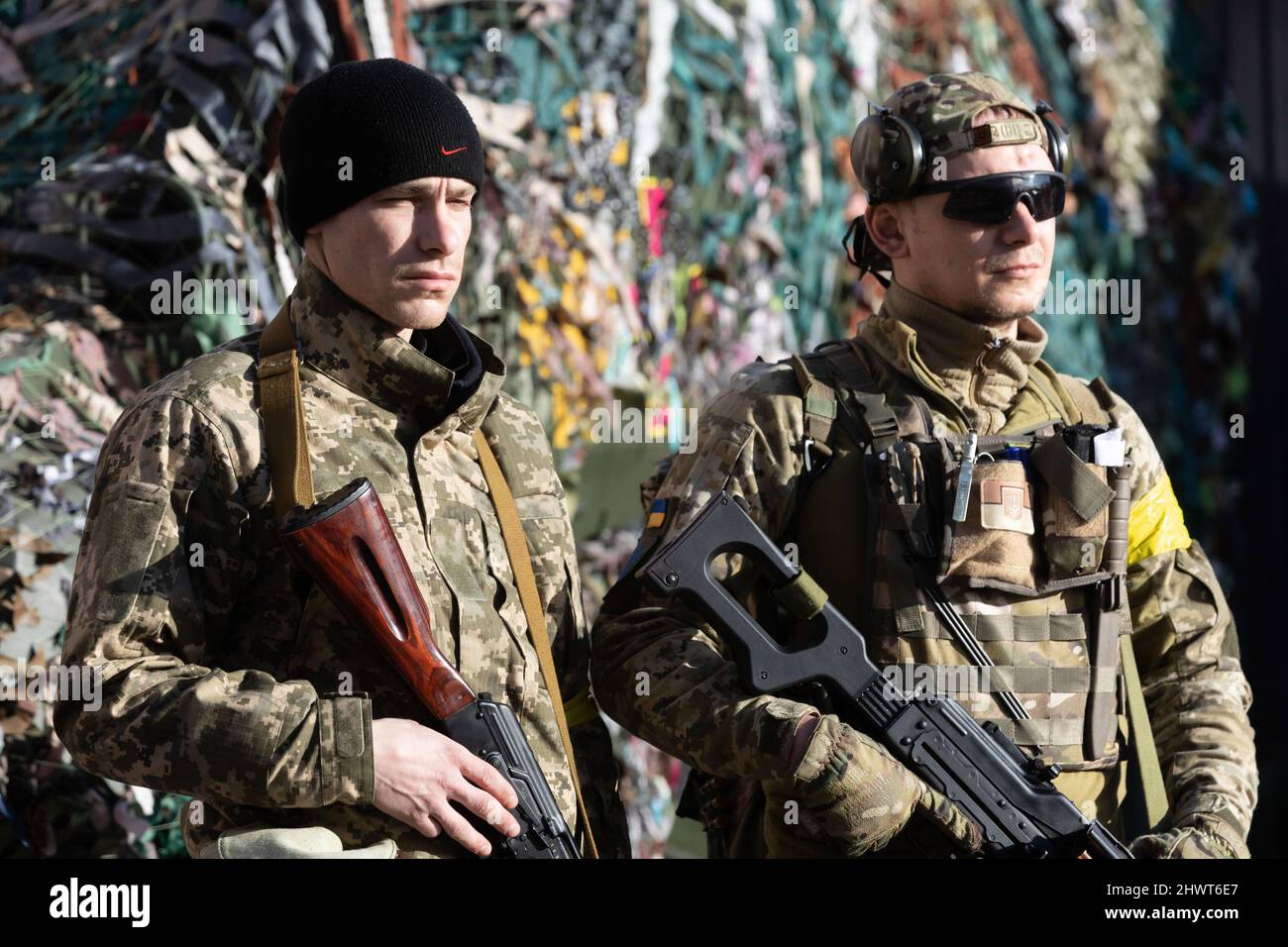 Members of Kyiv defence battalion seen holding their refiles. (Photo by ...