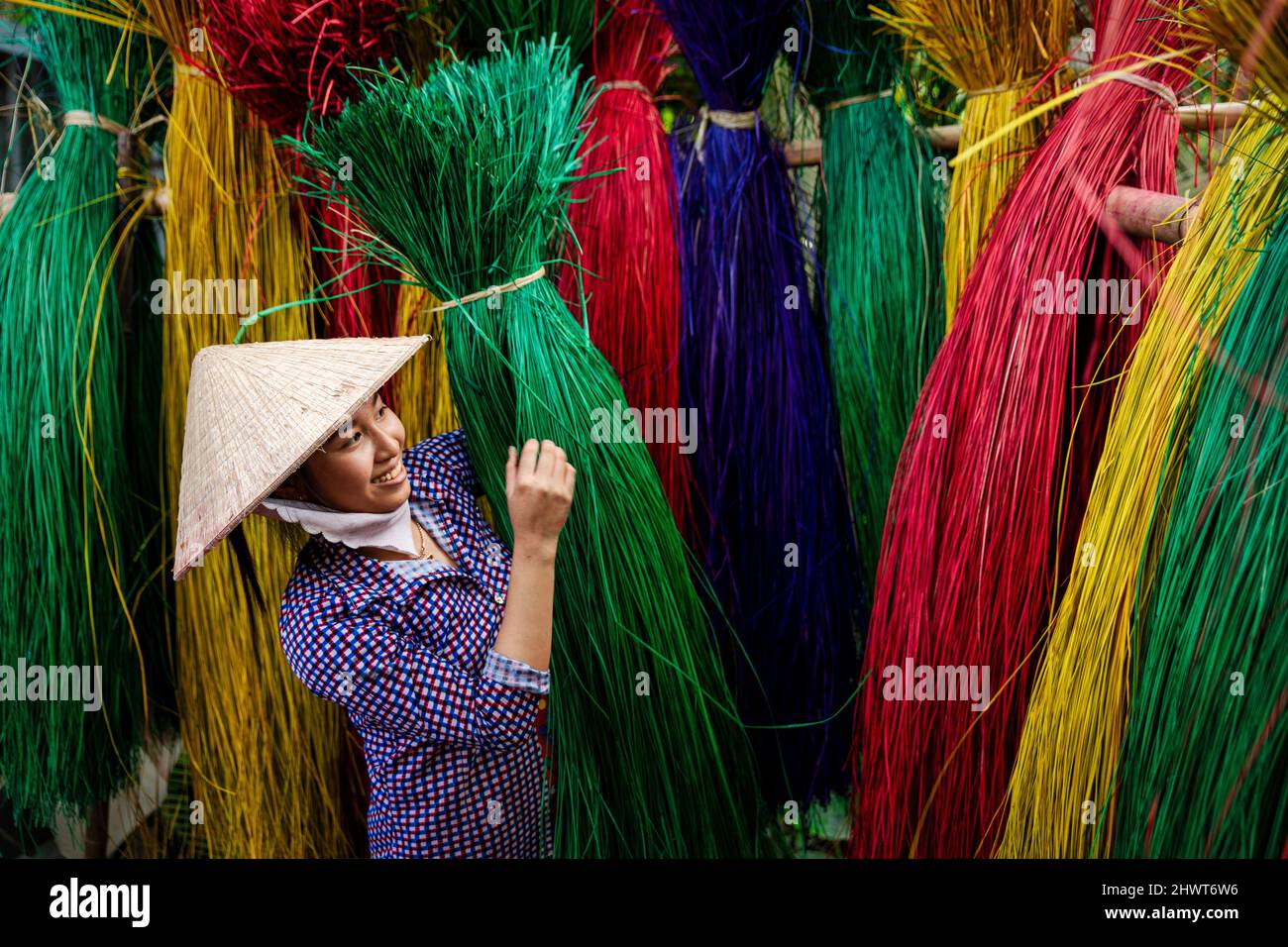 Vietnamese women drying traditional vietnam mats in the old traditional ...