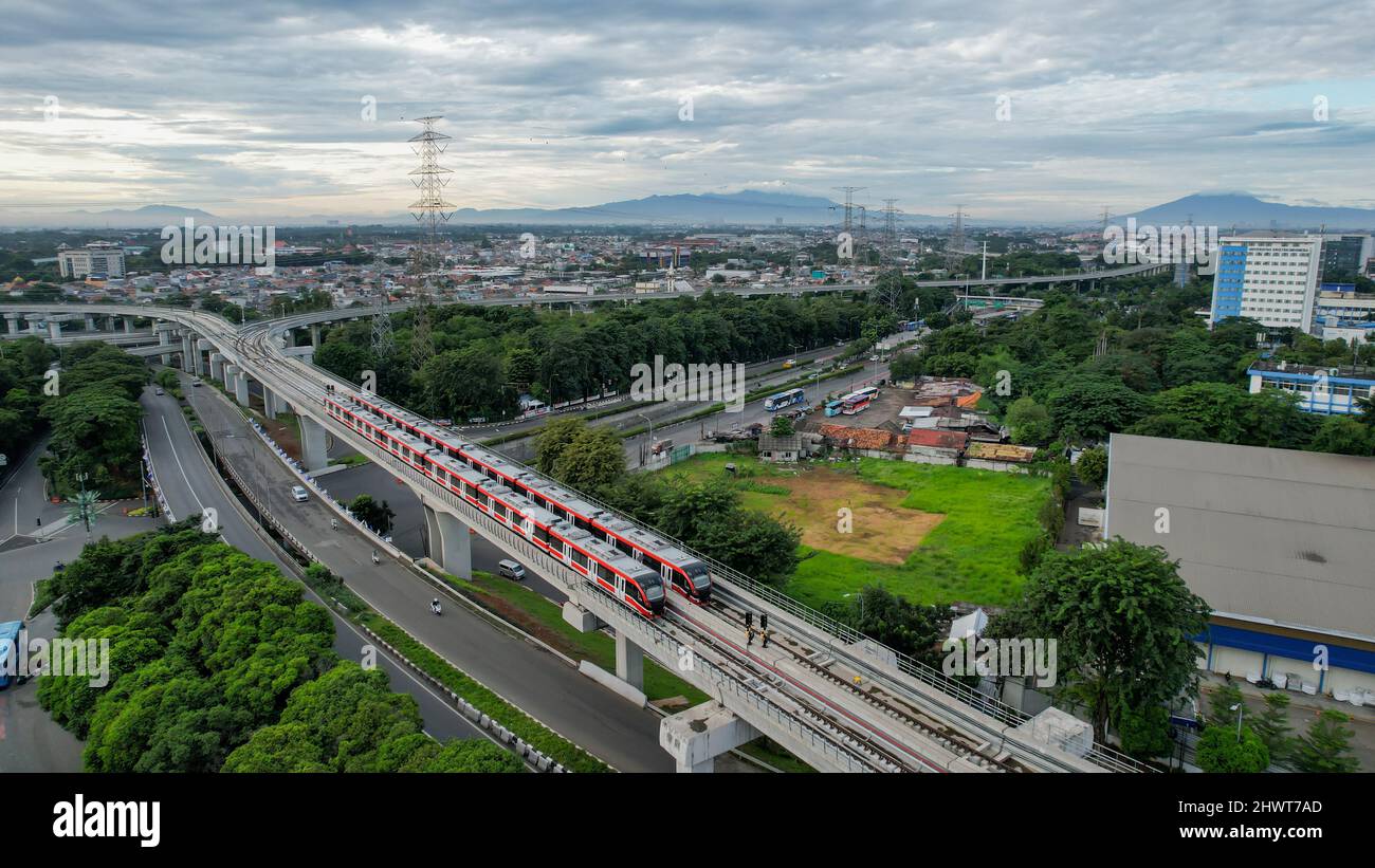 Aerial view of Jakarta LRT train trial run for phase 1 from UKI Cawang ...