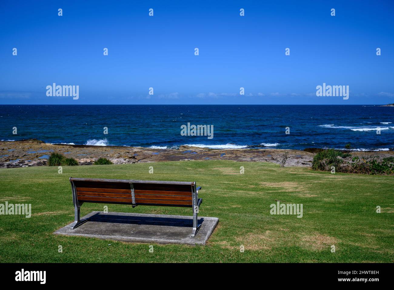 Empty bench looking out sea hi-res stock photography and images - Alamy