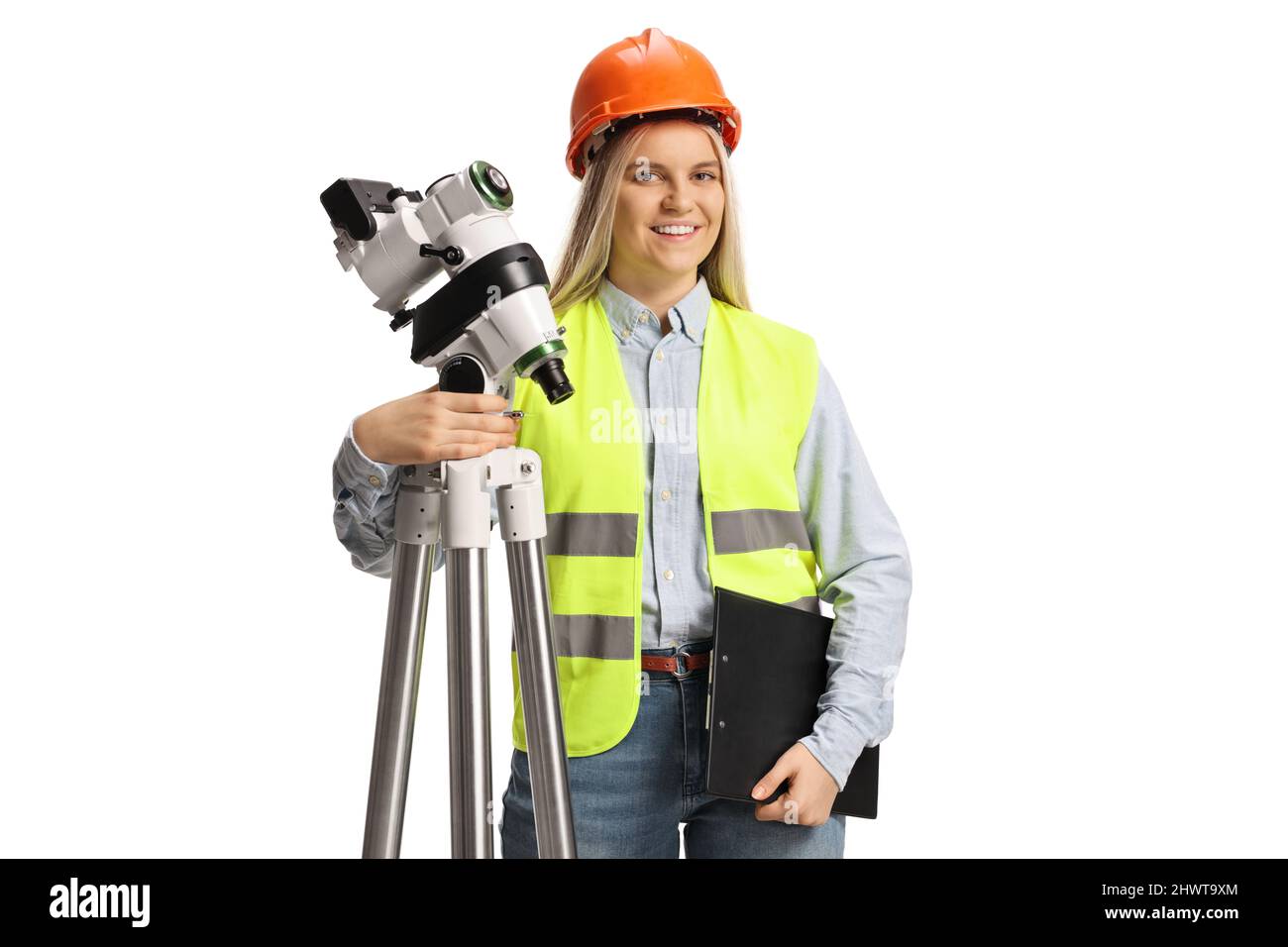 Female geodetic surveyor posing with a measuring equipment isolated on ...