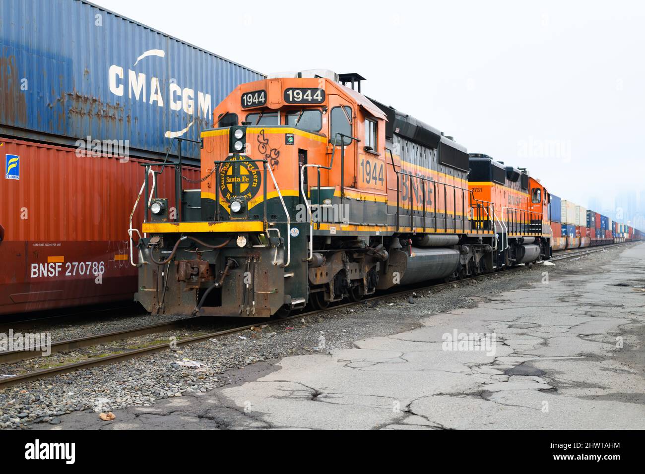 Seattle, WA, USA - March 06, 2022; BNSF locomotices alongside an ...