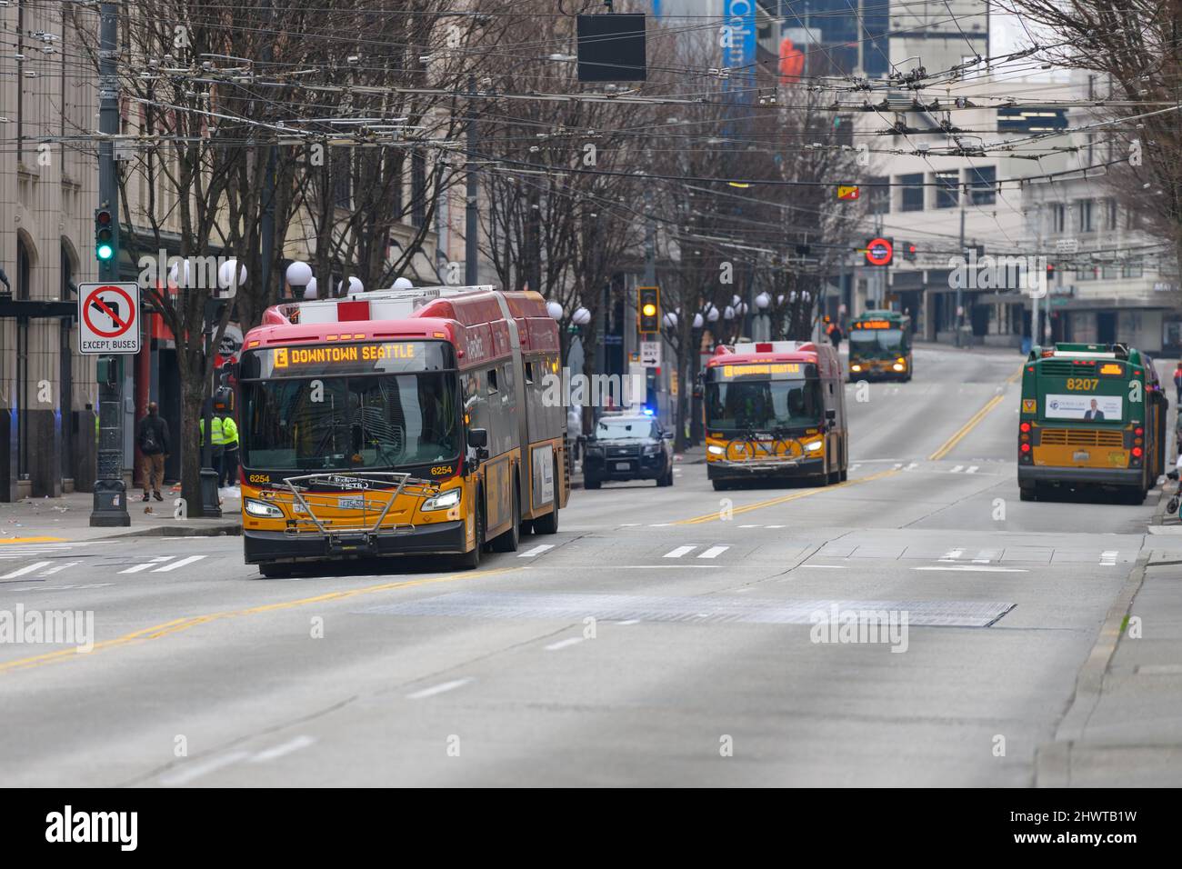 Seattle, WA, USA - March 06, 2022; Buses in downtown Seattle on the ...